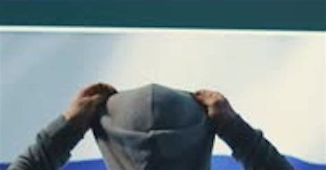 Vertical Video Russian Hacker With A Hood Installing Panic By