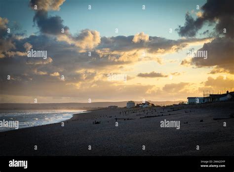 Sunset At Normans Bay On The East Sussex Coastline Sussex Uk Stock