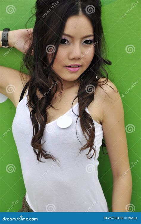 Pretty Thai Girl With Long Hair And Sleeveless Top Royalty Free Stock