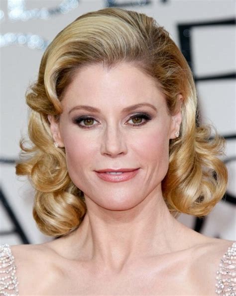 Julie Bowen Sporting A Swept Back Hairdo With Curls