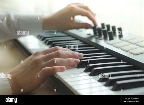 Female Adjust The Synthesizer Stock Photo Alamy
