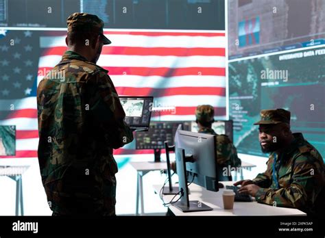Us Soldiers In A High Tech Command Center Protecting Classified Information Ensuring
