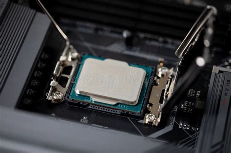 Closeup Of A Cpu Expertly Installed On A Motherboard Showcasing Its