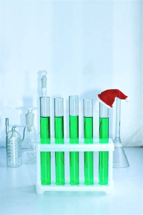 Five Vials Of Green Solution In A Chemical Lab On The End Tube Is A