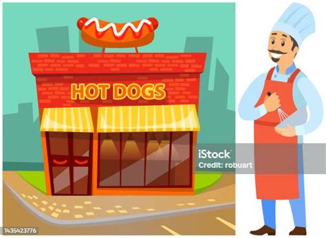 요리사는 핫도그를 준비하고 소시지를 곁들인 롤빵을 준비합니다 레스토랑을위한 미국 요리 패스트 푸드를 요리하는 남자 가공육에 대한