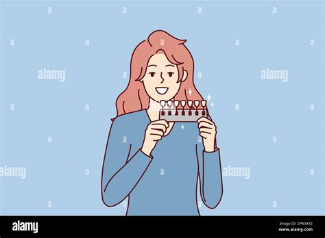 Woman Holds Device To Determine Shade Of Teeth Passes Test For Quality