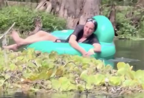 Woman Gets Dangerously Close To Alligator While Floating In River