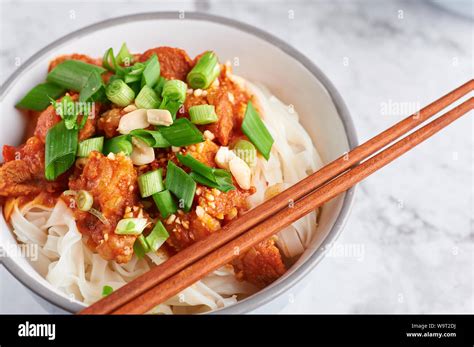 Shan Noodles With Chopsticks At White Marble Tabletop Burmese Cuisine