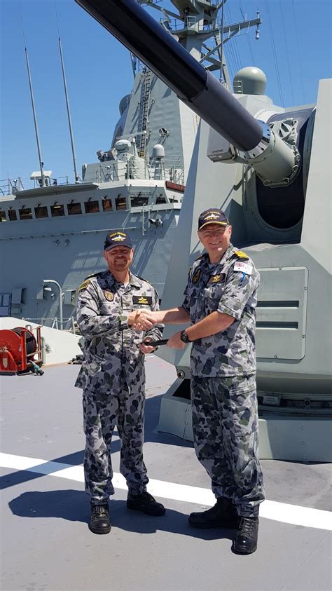 Handover Complete With The New Weeo Of Hmas Hobart Lcdr Darren Johnson