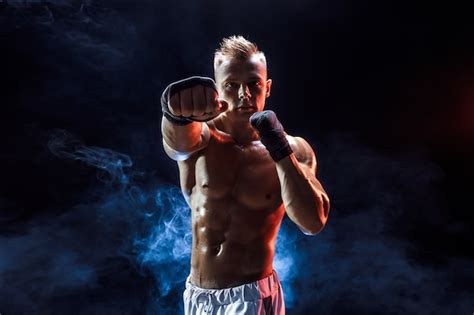 Premium Photo Muscular Topless Fighter In Boxing Gloves