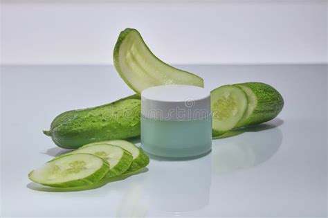 A Cosmetic Container Decorated On Minimal White Background With Several