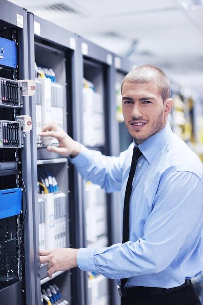 Premium Photo Young It Engineer In Datacenter Server Room