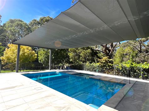 An Upgraded Pool Area With Retractable Shade Ods