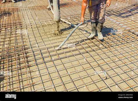 Worker Is Using Vibration Power Tool Compactor For Compacting Fresh