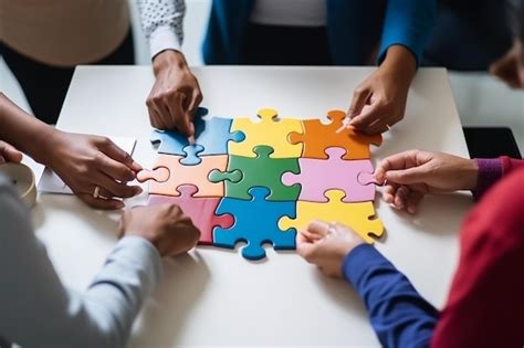 Premium Ai Image People Are Assembling A Puzzle Piece Together On A Table Generative Ai