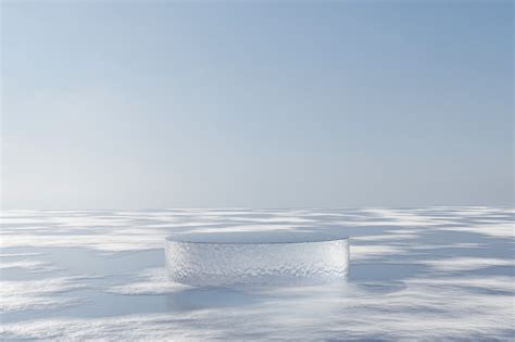 3d 렌더링 플랫폼 배경과 겨울에는 맑은 하늘이 있는 얼음 설원에 빈 원형 무대 얼음 연단이 제품 스탠드 디스플레이 광고 화장품 미용 제품 스킨케어 등을 제공합니다 겨울에