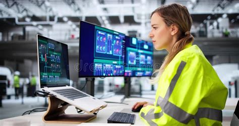 Female Engineer Monitoring Production Line Using Scada System Stock