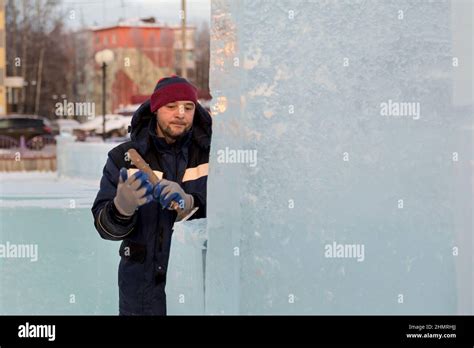 Worker With A Chisel In His Hand At A Construction Site Stock Photo Alamy
