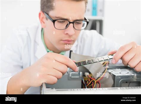 Technician Working On Broken Cpu Stock Photo Alamy