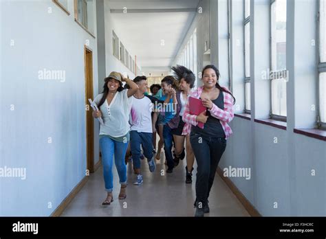 Babes Running Down Hallway Laughing Stock Photo Alamy