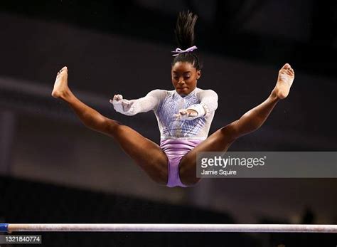 Simone Biles Competes On The Uneven Bars During The Senior Womens