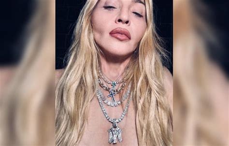 Madonna Shares Flirty Summer Snaps With Mystery Man