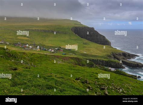 View Of Mykines Village On The Coast From Far Mykines Faroe Islands