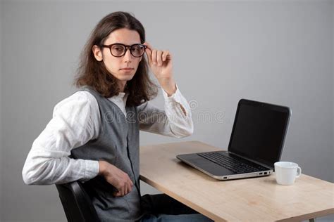 Programming And Application Development A Young Man Writes Code