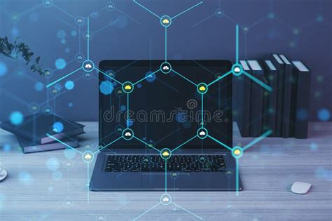 Close Up Of Laptop On Office Desk With Creative Glowing Hexagonal Pattern With Tiny Padlocks On