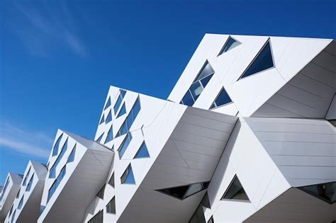 Premium Ai Image A Building With A Triangular Shape On The Top Premium Ai Image A Building With A Triangular Shape On The Top