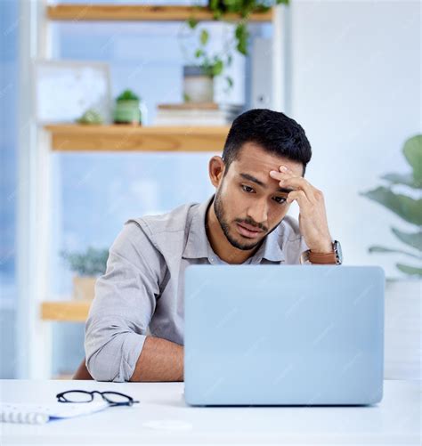 Premium Photo Business Burnout And Man With A Headache Laptop And Overworked With Health