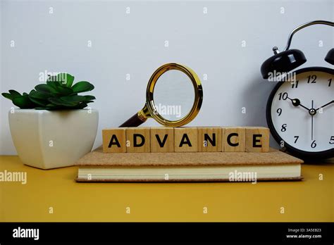 Magnifying Glass And Alarm Clock With Wooden Blocks Alphabet Letters Advance Text Message On