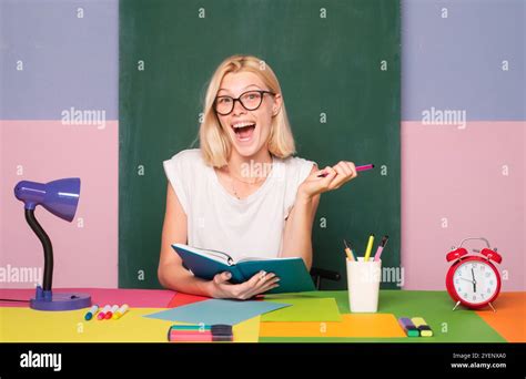 Shcool Teacher In Class On Blackboard Background Professional Portrait