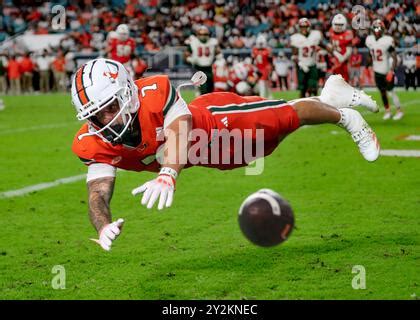 Miami Wide Receiver Xavier Restrepo 7 Runs The Ball During An Ncaa
