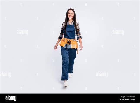 Full Size Photo Of Happy Good Mood Lovely Woman Constructor Go Walk