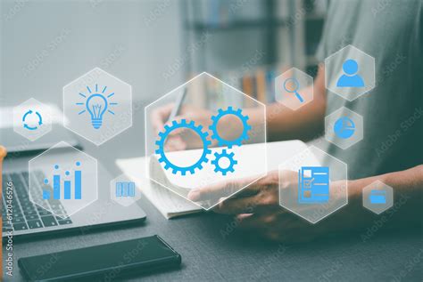 Businessman Analyze Processes And Automate Workflows With Flowcharts