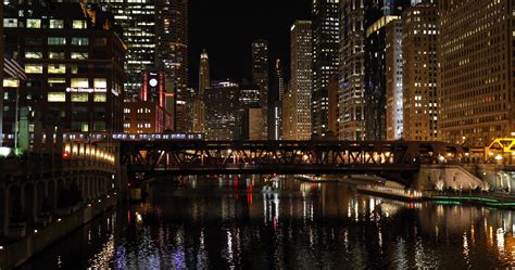 City Skyline At Night With Bridge