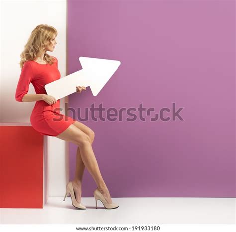 Sexy Girl Holding White Arrow