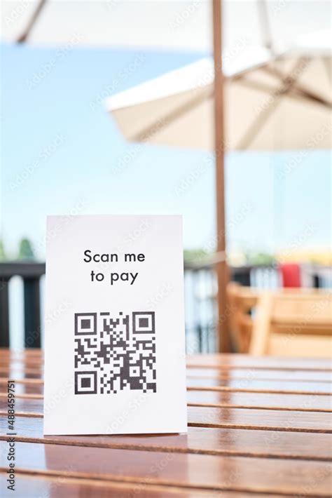 Qr Code For Contactless Cashless Payment Placed On The Table Of A
