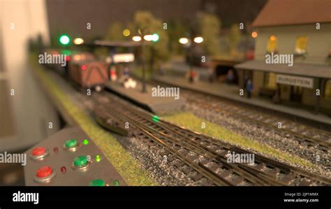 Model Steam Locomotive Passing Through Station Mini Passenger Train Moving On Mini Railroad