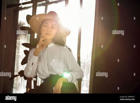 Freestyle Young Woman Sitting Near Window Closed Eyes Relaxed In