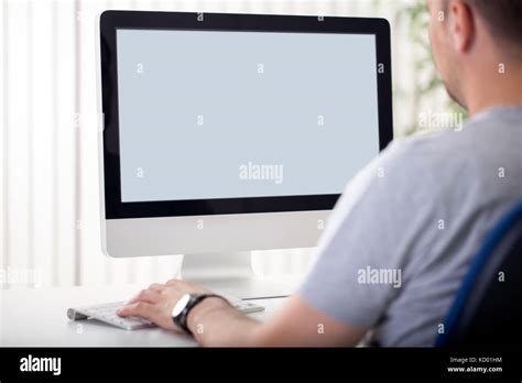 Man In Front Of Computer Screen Stock Photo Alamy