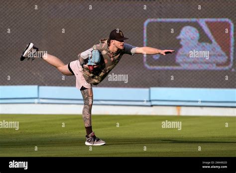 San Diego Padres Pitcher Josh Hader Stretches In The Outfield During Baseball Practice Monday