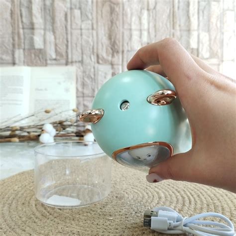 دستگاه بخور سرد کیوت همراه با کابل شارژ Tezt