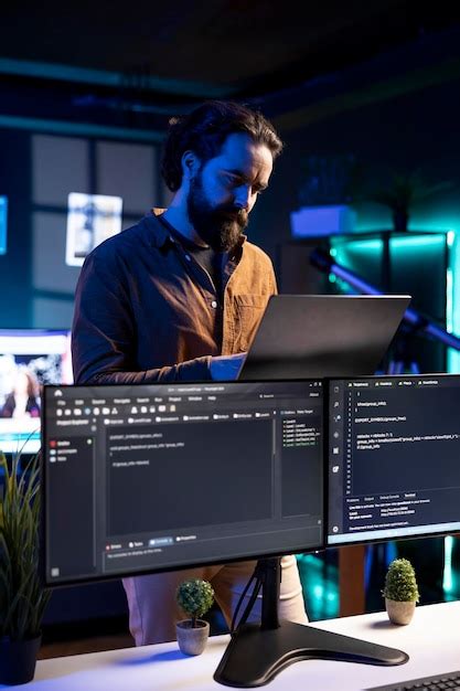 Premium Photo Software Engineer Checking Code Displayed On Computer