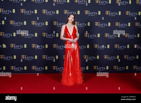Michelle Monaghan Poses At The 78th British Academy Film Awards Bafta