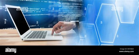 Hand Using Laptop And Coding Text With Transition Stock Photo Alamy