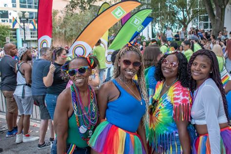 Nice Colorful Womans In Come Out With Pride Orlando Parade At Lake Eola