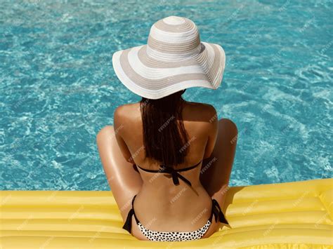 Premium Photo Sexy Beautiful Woman Model In Bikini Is Relaxing In