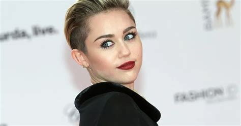 Miley Cyrus Naked With Side Boob Showing In Bed With Her Dog Mary Jane